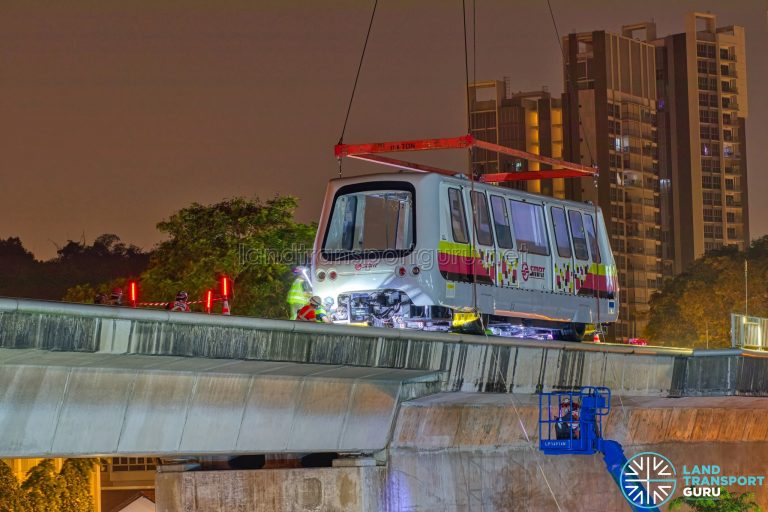 Securing of BPLRT C801A Light Rail Vehicle (Car 131) onto guideway ...